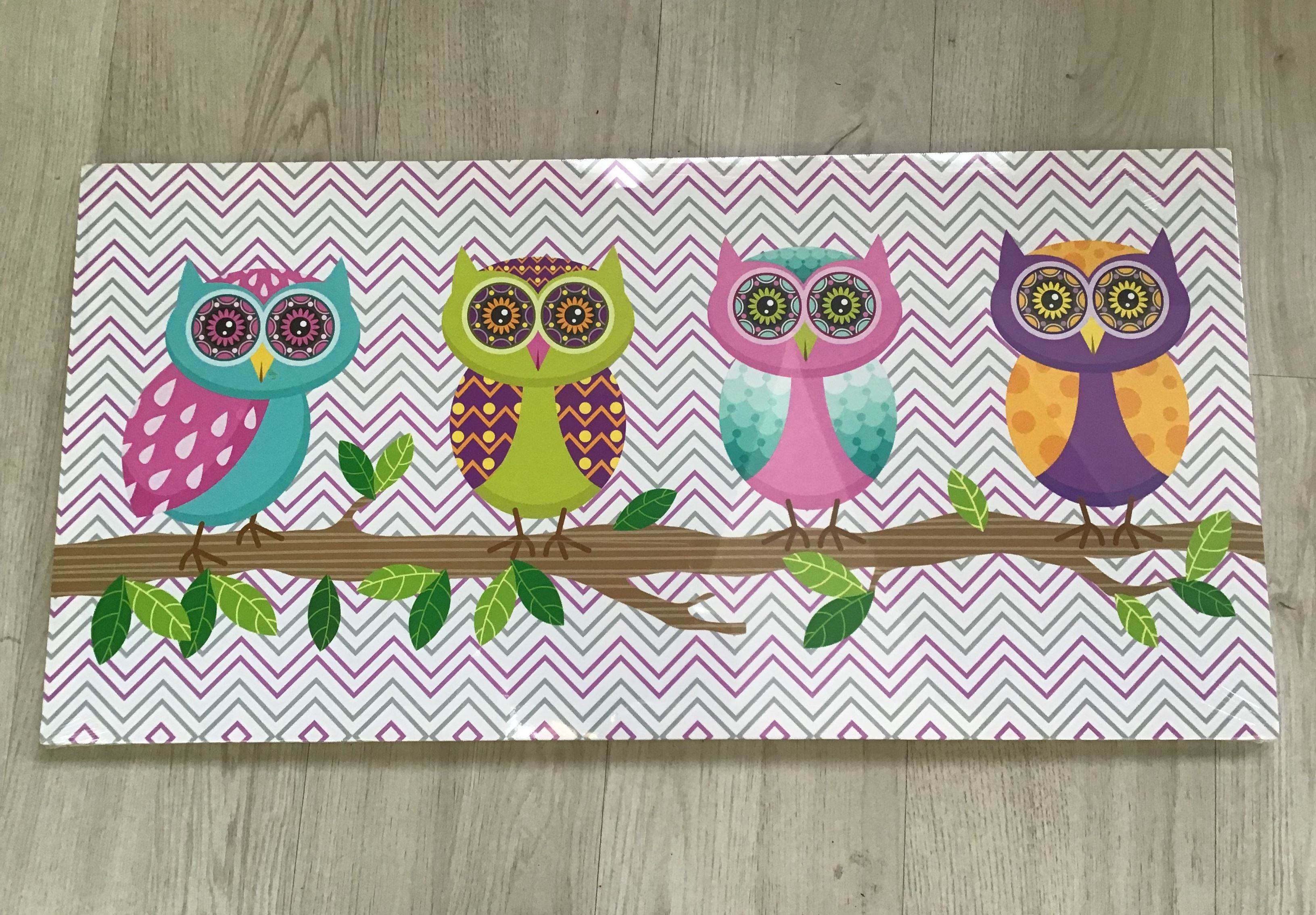 Simpatico cuadro en lienzo estampado de Buhos