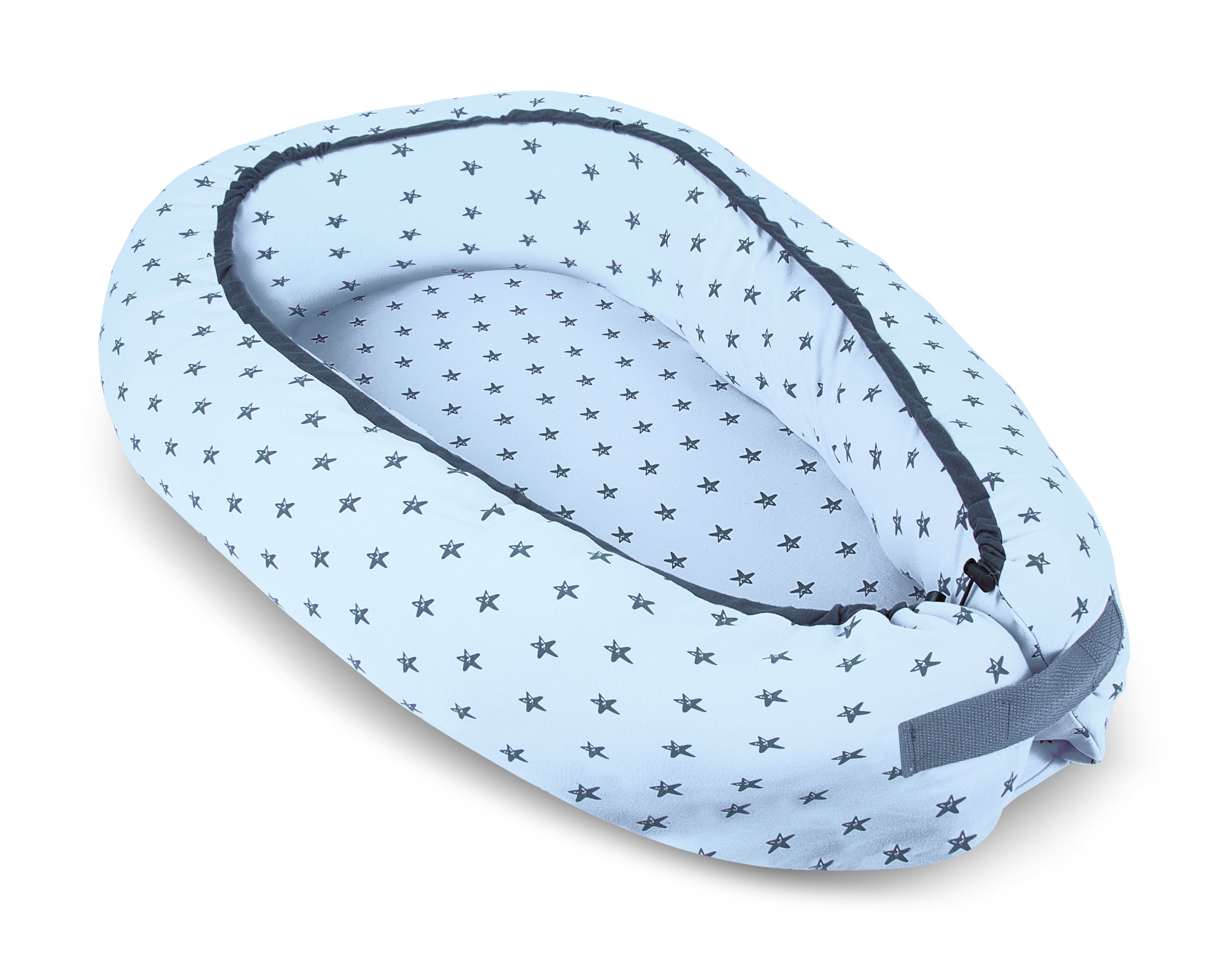 Cojín reductor para convertir la cuna en un capazo comodo para el bebe.